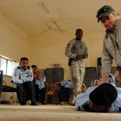 Justice Accuses DynCorp of False Claims on Iraq Contract - Government ...